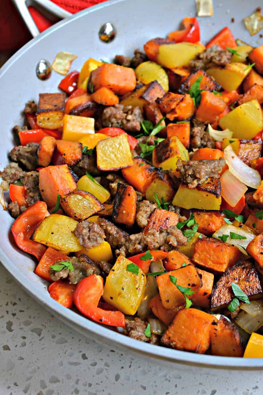 Sweet Potato Hash with Eggs Sausage and Peppers